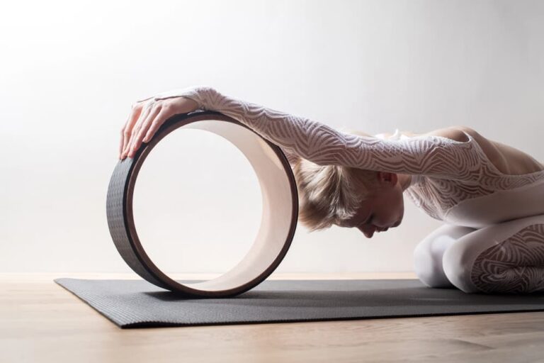 5 Easy Yoga Wheel Positions for Beginners